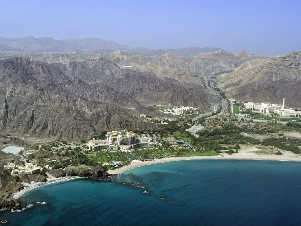 Broadway Malyan | Nestled between the Hajar Mountains and the azure…